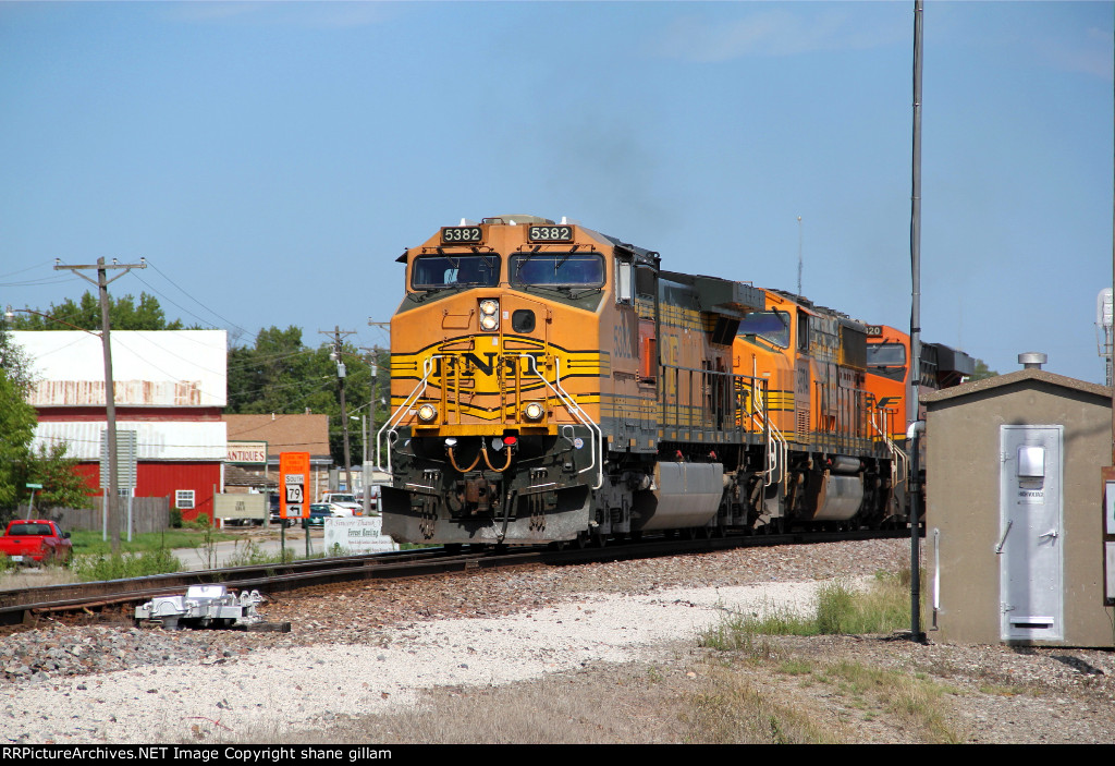 BNSF 5382 heads a ore load Sb out of elsberry MO,